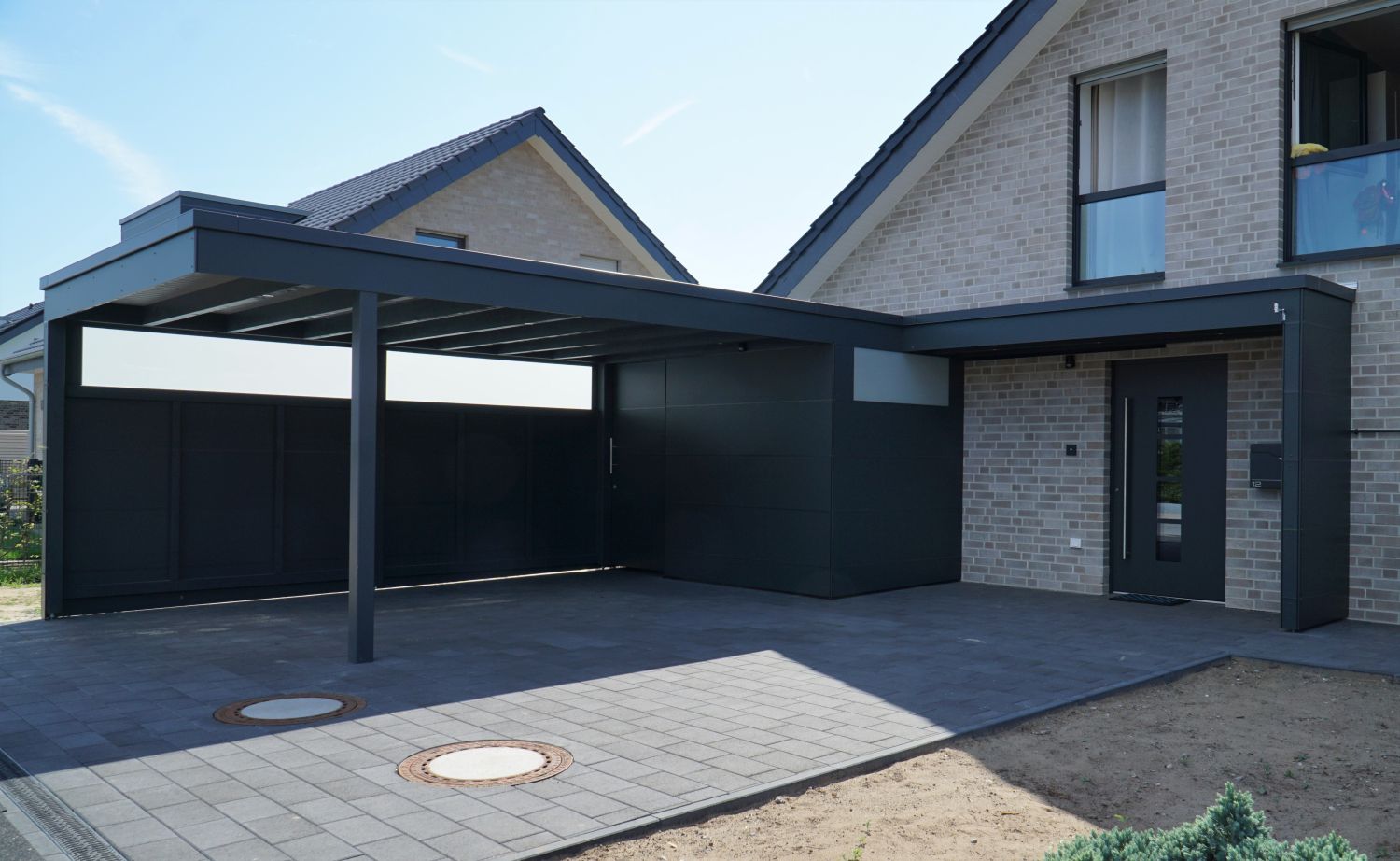 Carport mit HPL Platten und Abstellraum in Delbrück | Pollmeier Holzbau ...